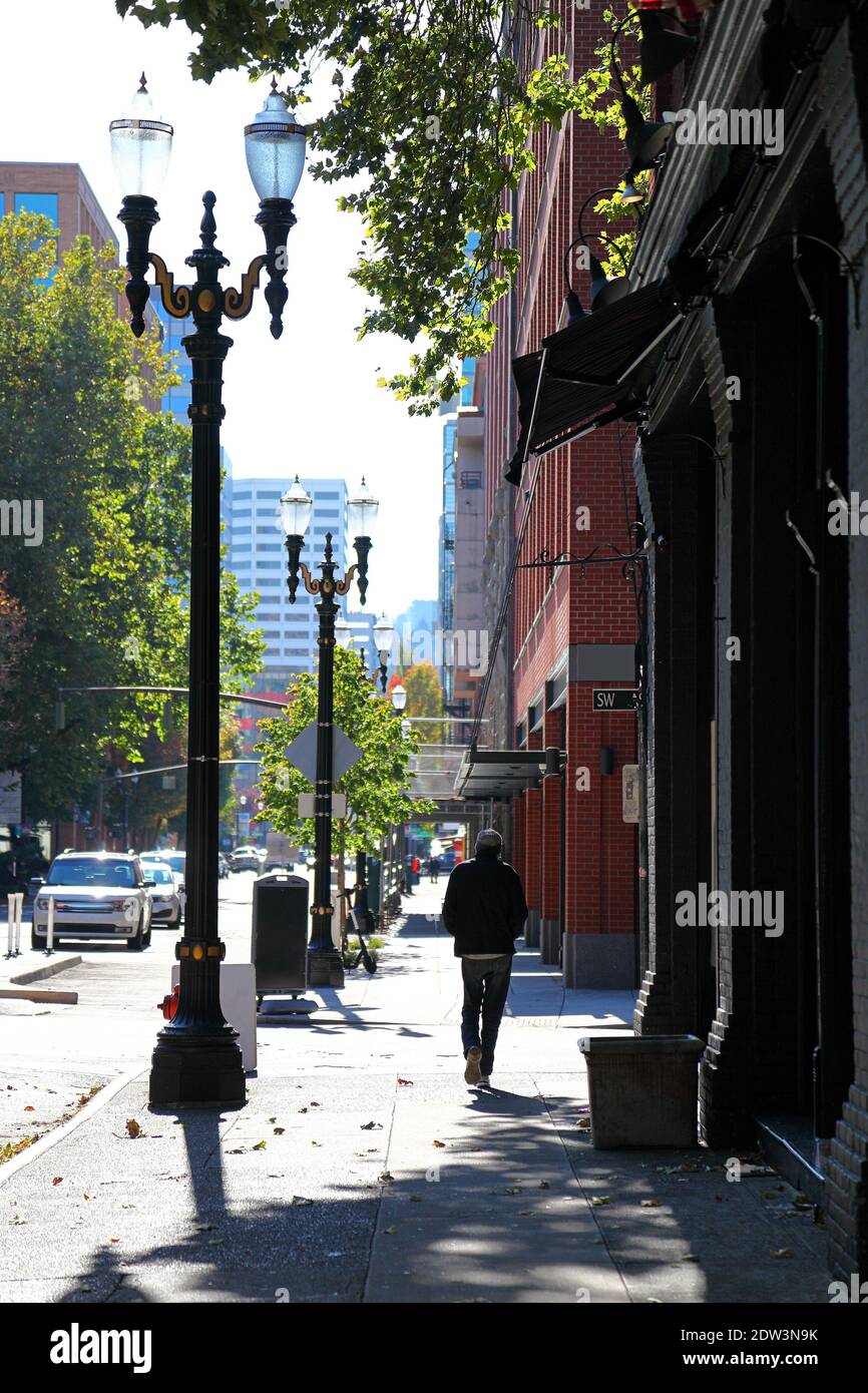 Person in city hi-res stock photography and images - Alamy