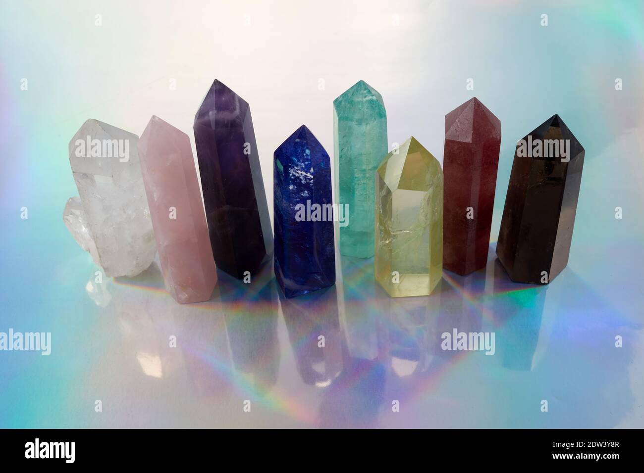 Healing Chakra crystals on halographic background. Meditation, Reiki or ...