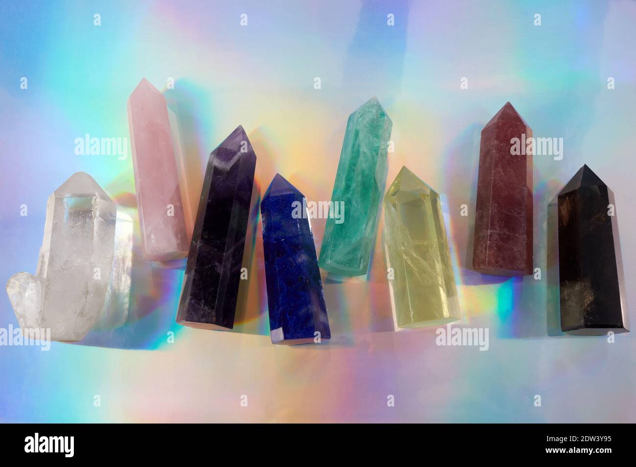 Healing Chakra crystals on halographic background. Meditation, Reiki or ...