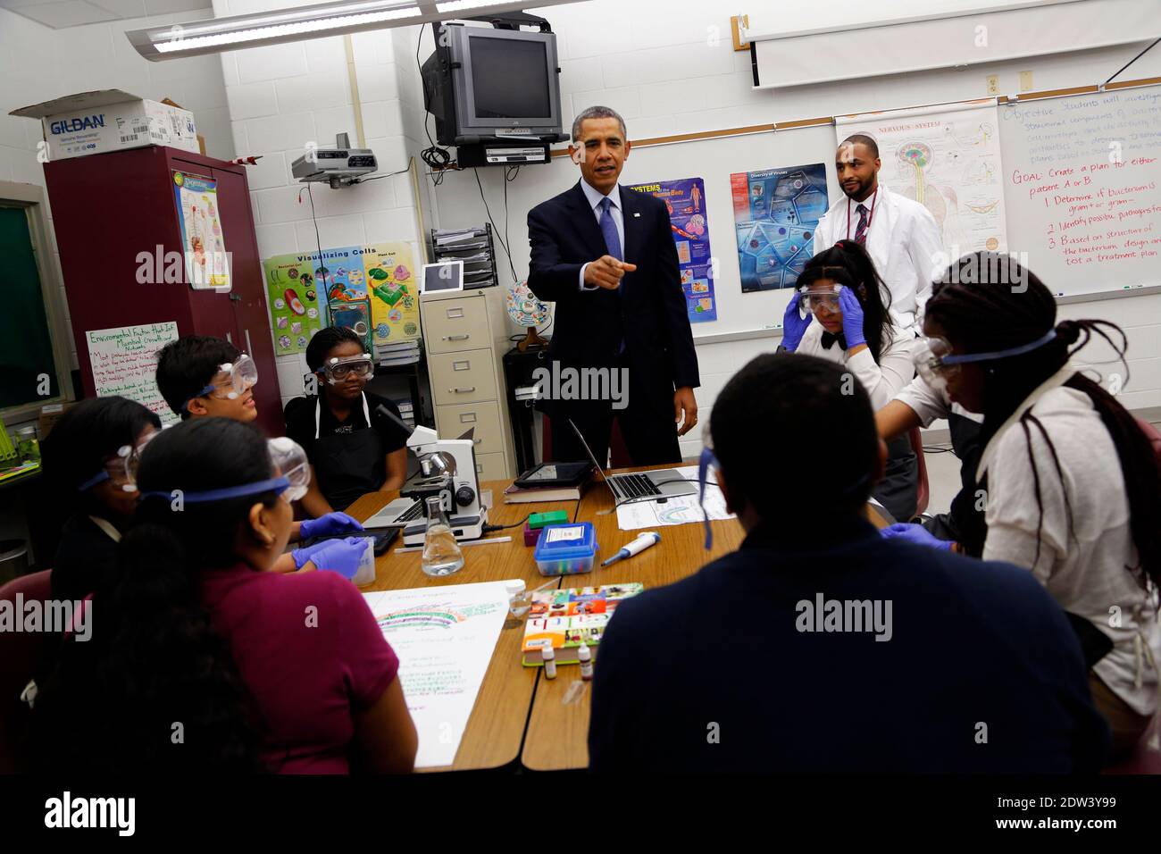 US President Barack Obama visits a 10th grade Microbiology class at ...