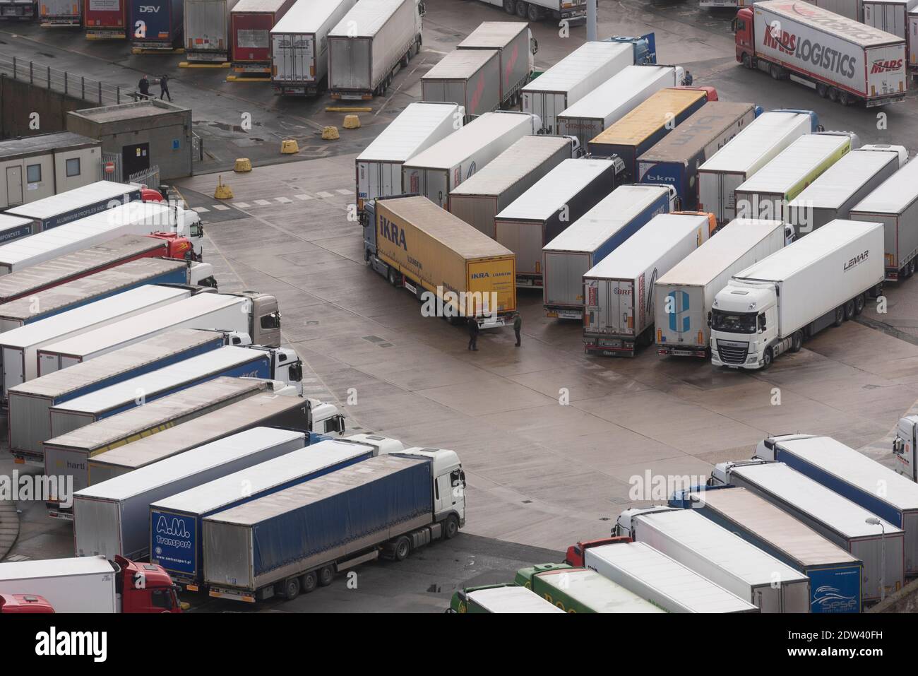 Dover, Britain. 22nd Dec, 2020. Trucks are seen parked near the closed ...