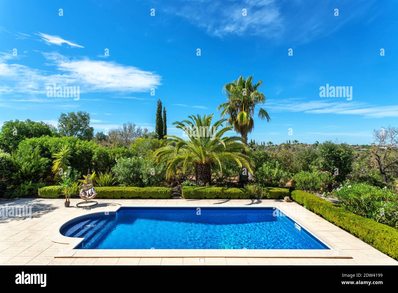 Luxury swimming pool with sun loungers. For relaxation and swimming ...