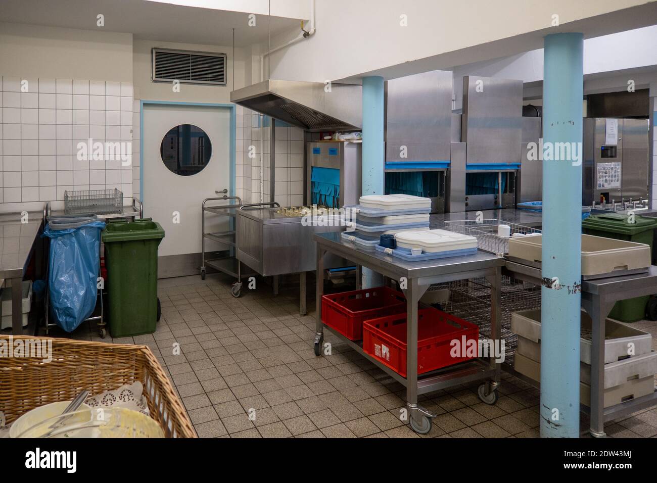 in a hospital kitchen there is a dish washing line Stock Photo - Alamy