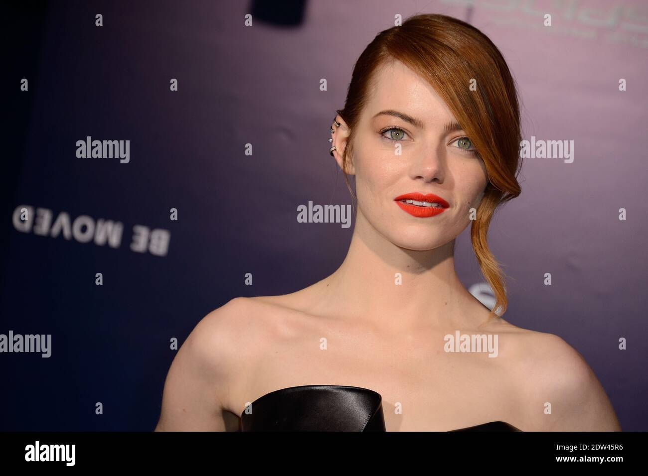 Emma Stone attending the premiere of the film The Amazing Spiderman 2 ...