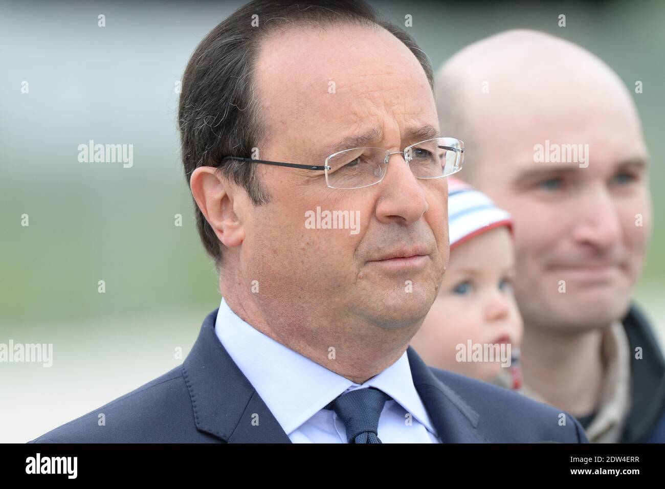 French president Francois Hollande and Nicolas Henin seen at ...