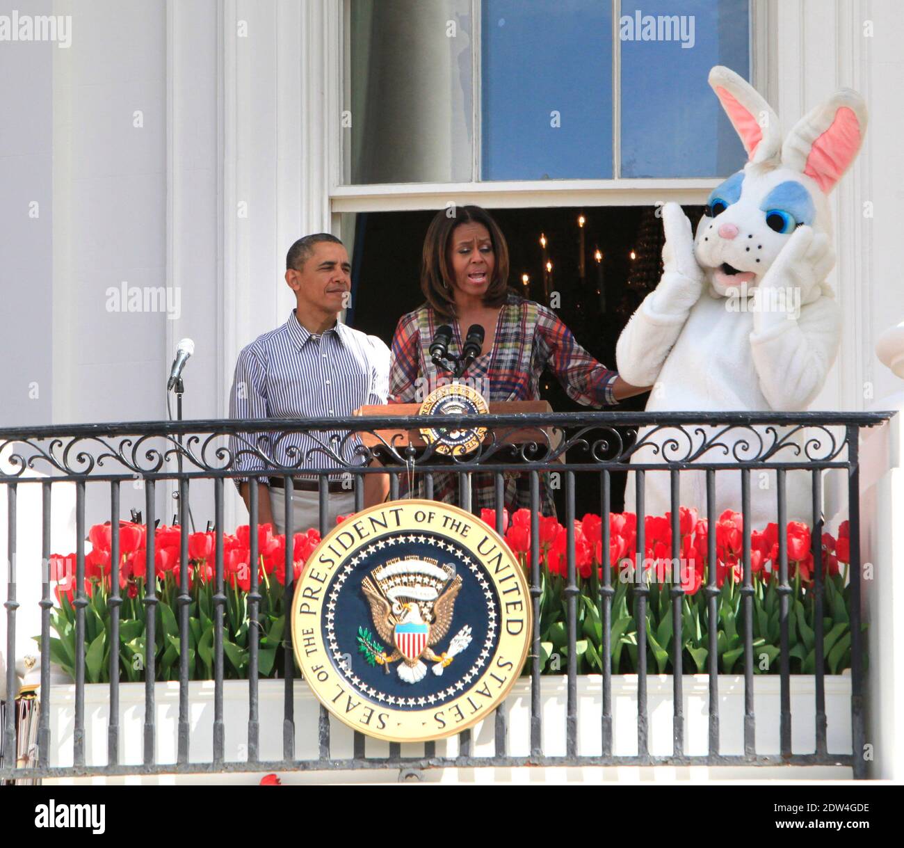 President Barack Obama and First Lady Michelle Obama participate in the ...