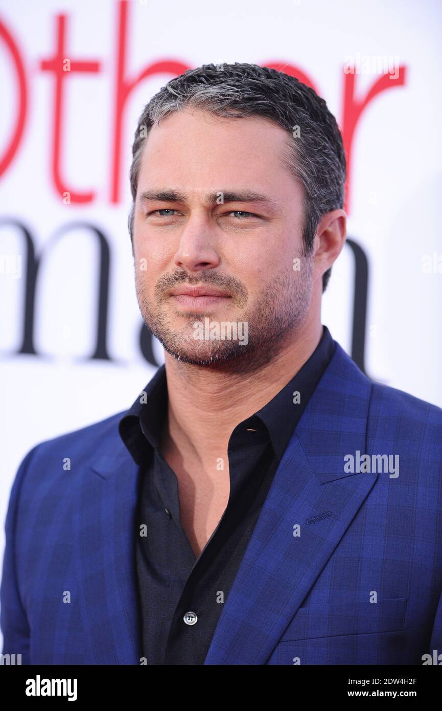 Taylor Kinney attends the premiere of Twentieth Century Fox's 'The ...