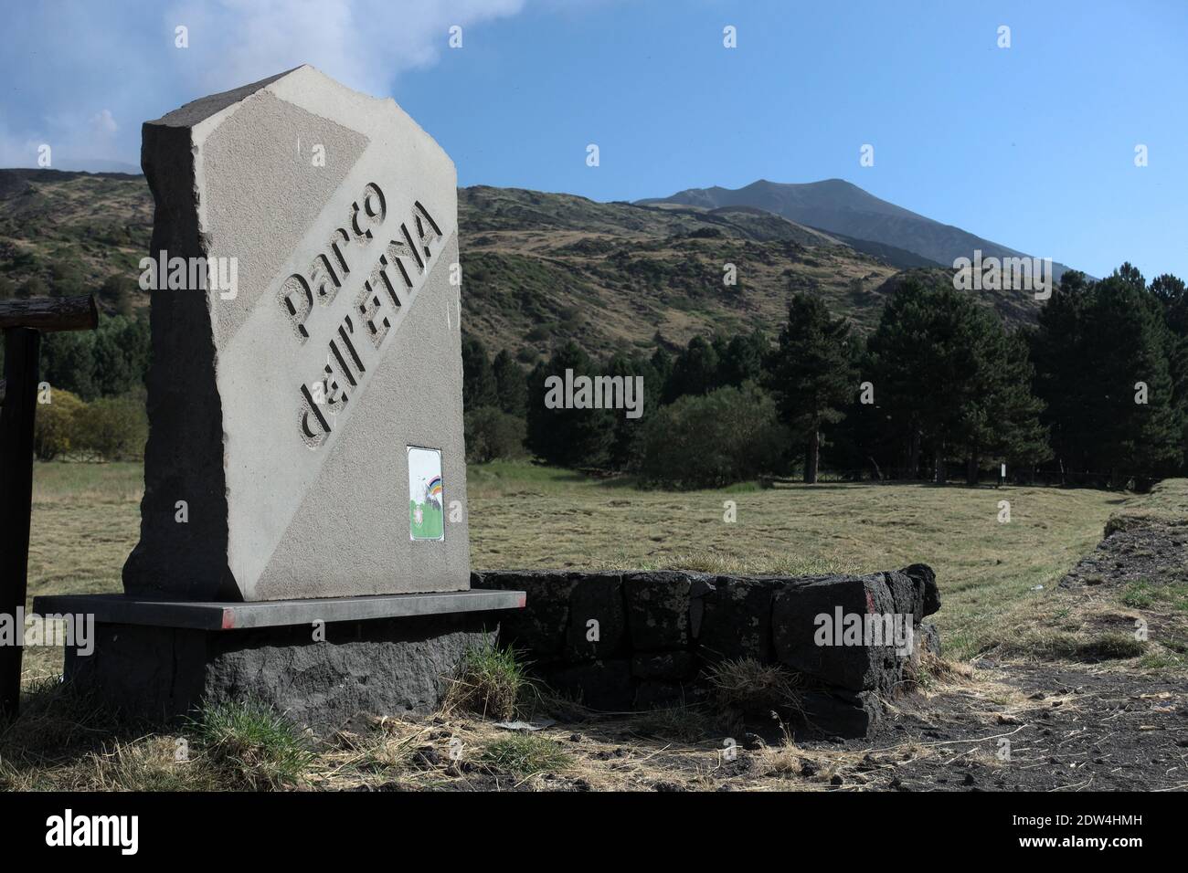 the inscription, "Parco dell'ETNA" carved on a monolith of basalt stone ...