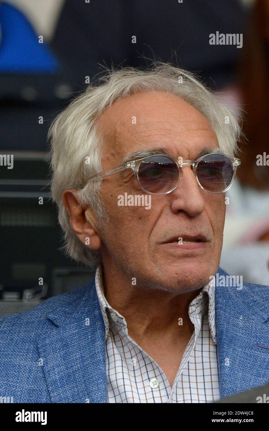 Actor Gerard Darmon attending the French First League soccer match ...