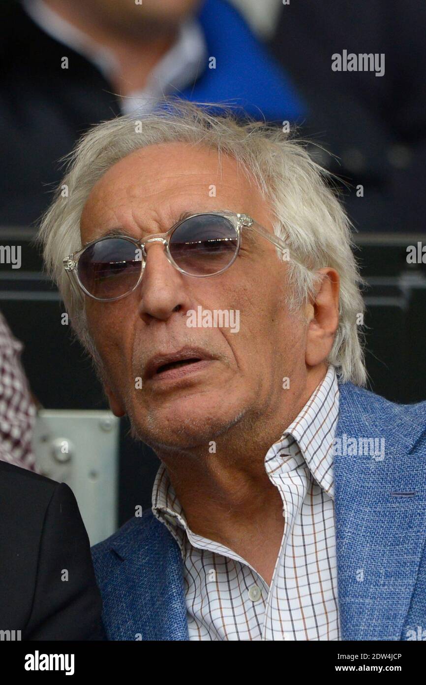 Actor Gerard Darmon attending the French First League soccer match ...