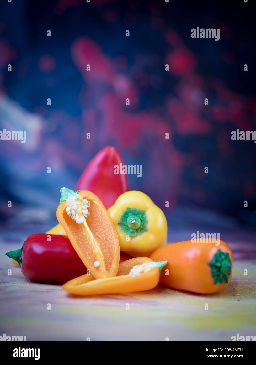 Colourful fun sized peppers, food ingredient still-life Stock Photo - Alamy