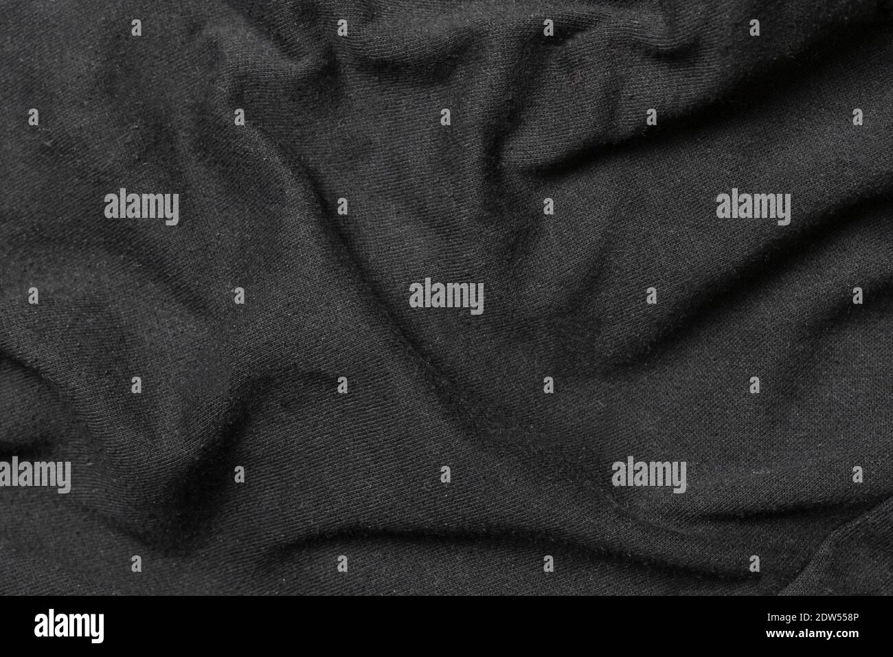 wrinkled and crumpled waves of the colorful clothes textile texture ...