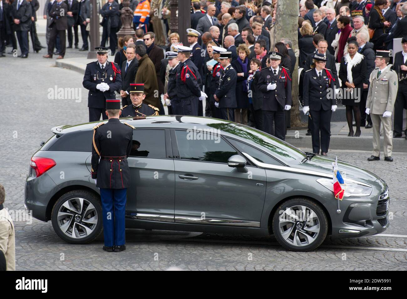 French President Francois Hollande leaves the ceremony in his Citroen ...