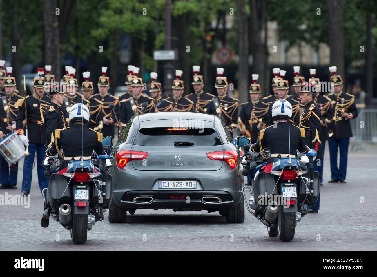 French President Francois Hollande arrives in his Citroen DS5 at a ...