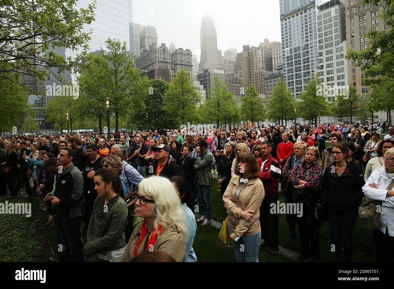 NEW YORK, NY - MAY 15: People watch a live video from the Ground Zero ...