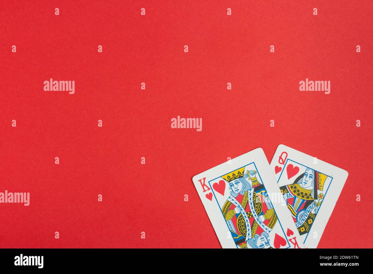 A beautiful red Valentine's day card with heart-shaped playing cards ...