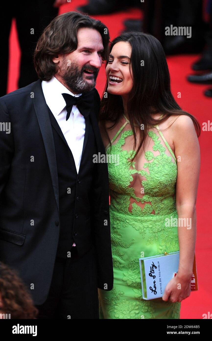 Frederic Beigbeder and his wife Lara arriving at Saint-Laurent ...