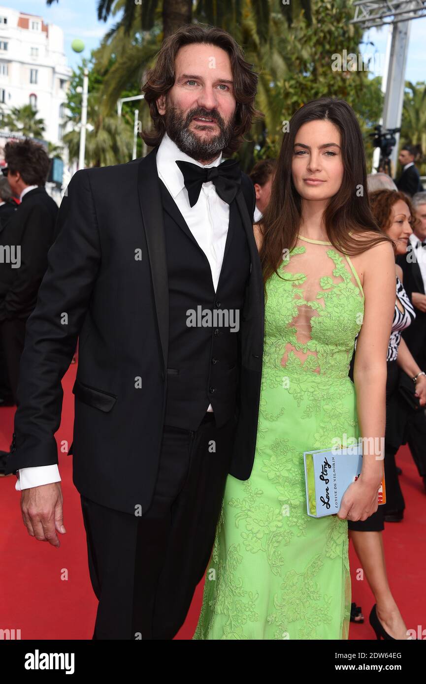 Frederic Beigbeder and his wife Lara arriving at Saint-Laurent screening held at the Palais Des ...