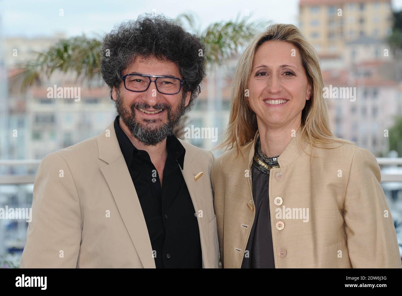 Radu Mihaileanu, Stephanie Valloatto posing at the photocall for ...