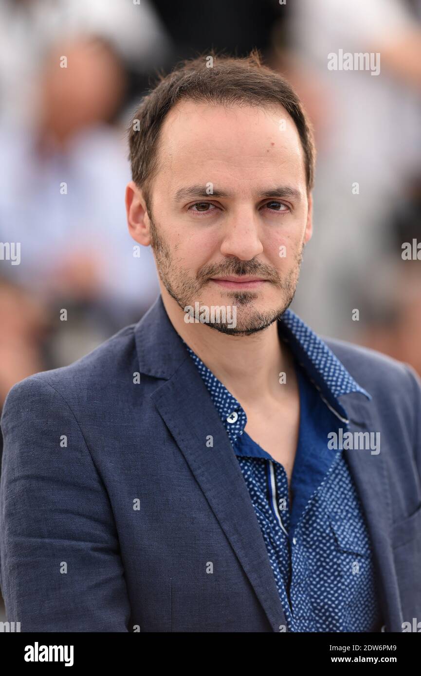 Fabrizio Rongione posing at the photocall for the film Deux Jours, Une ...