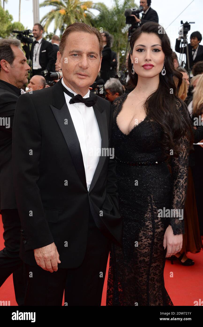 Eric Besson and his wife Yasmine Tordjam arriving at the Palais des ...