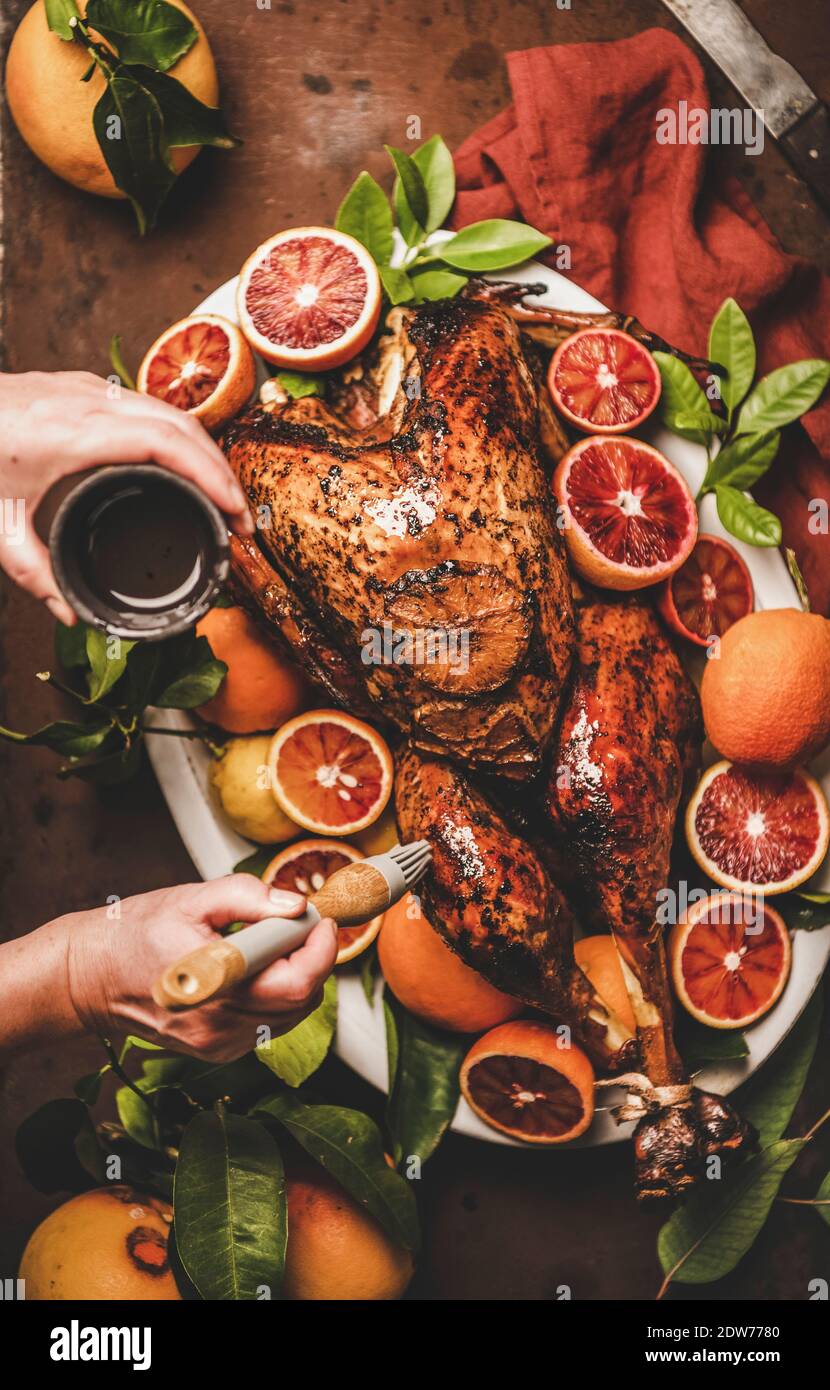 Christmas or Thanksgiving Day festive table preparation. Womans hand ...