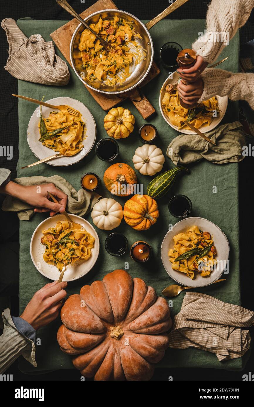 Flat-lay of Autumn dinner for gathering or Thanksgiving Day celebration ...