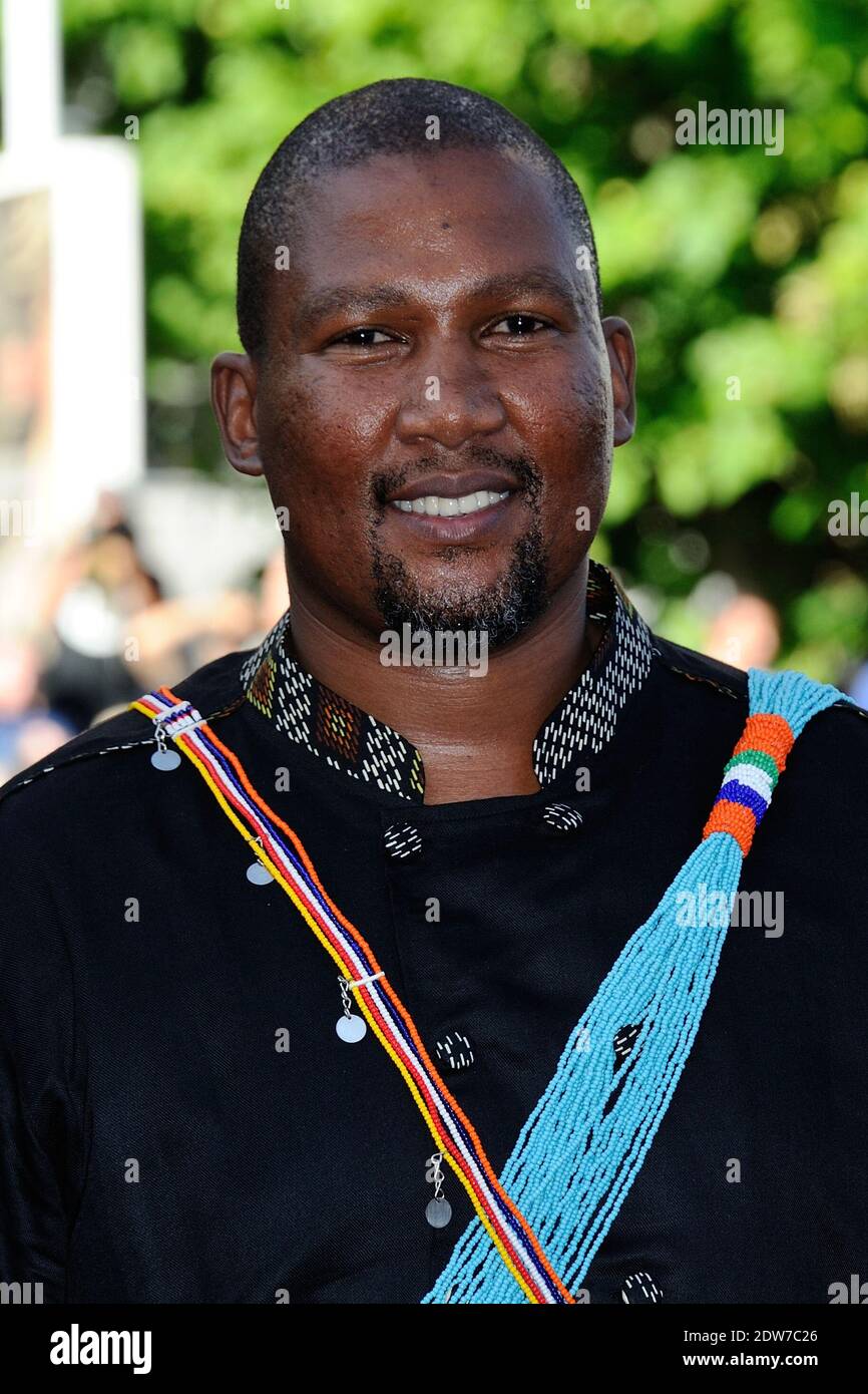 Mandla Mandela arriving at the Palais des Festivals for the screening ...