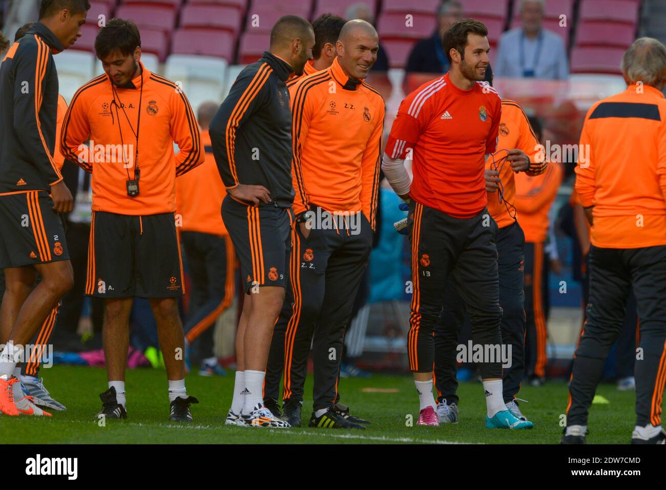 Real Madrid's assistant coach Zinedine Zidane and Karim Benzema during ...