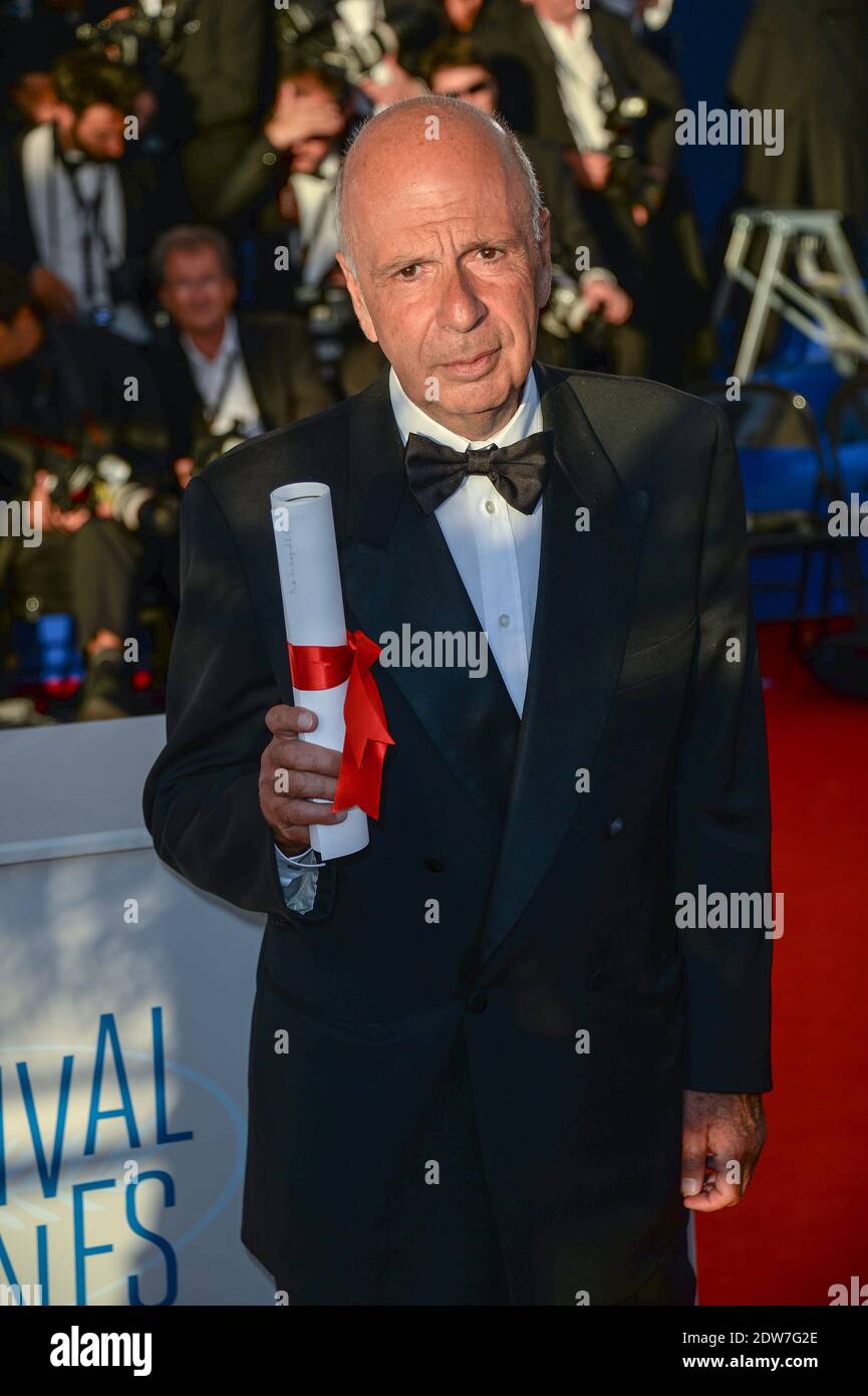 Alain Sarde posing at the Palme D'Or Winners photocall at the Palais ...