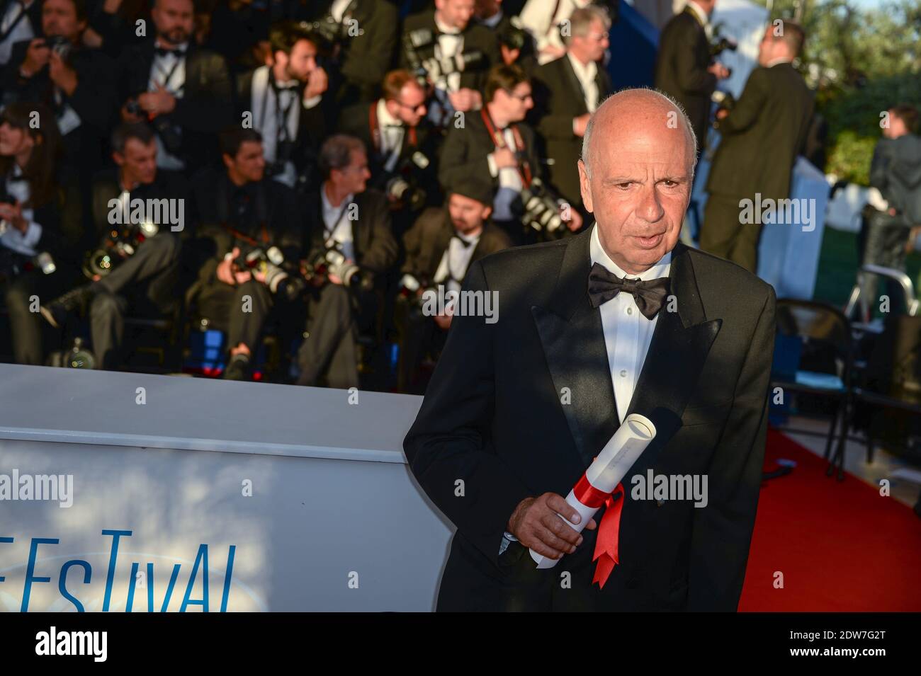 Alain Sarde posing at the Palme D'Or Winners photocall at the Palais ...