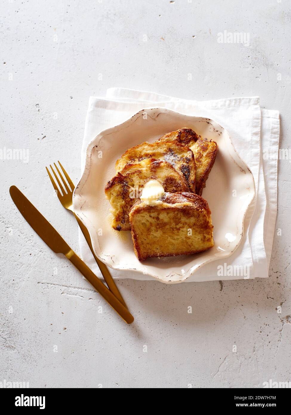 French toasts for breakfast with butter and powdered sugar Stock Photo ...