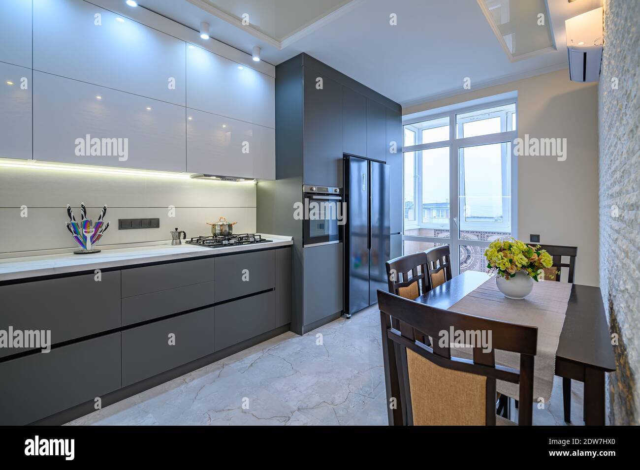 Luxury white and dark grey modern kitchen interior Stock Photo - Alamy