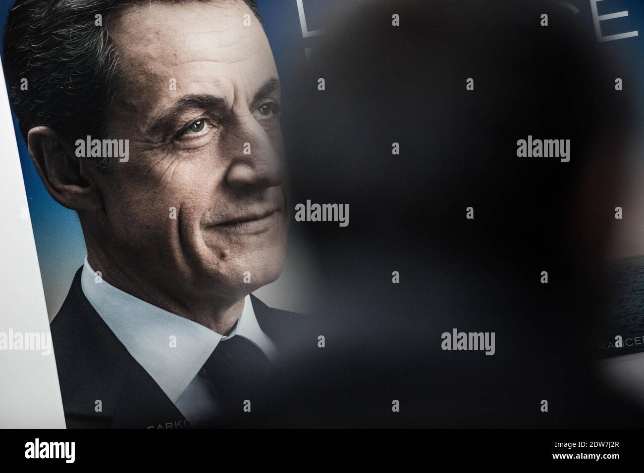 A Nicolas Sarkozy poster is pictured, atmosphere at the UMP party ...