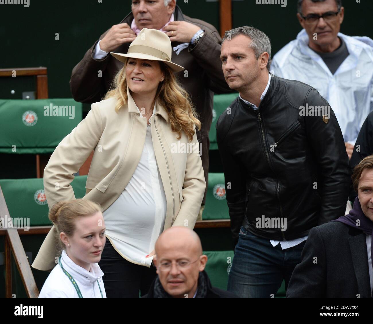Astrid Bard and her husband Yann Delaigue watching a game during the ...
