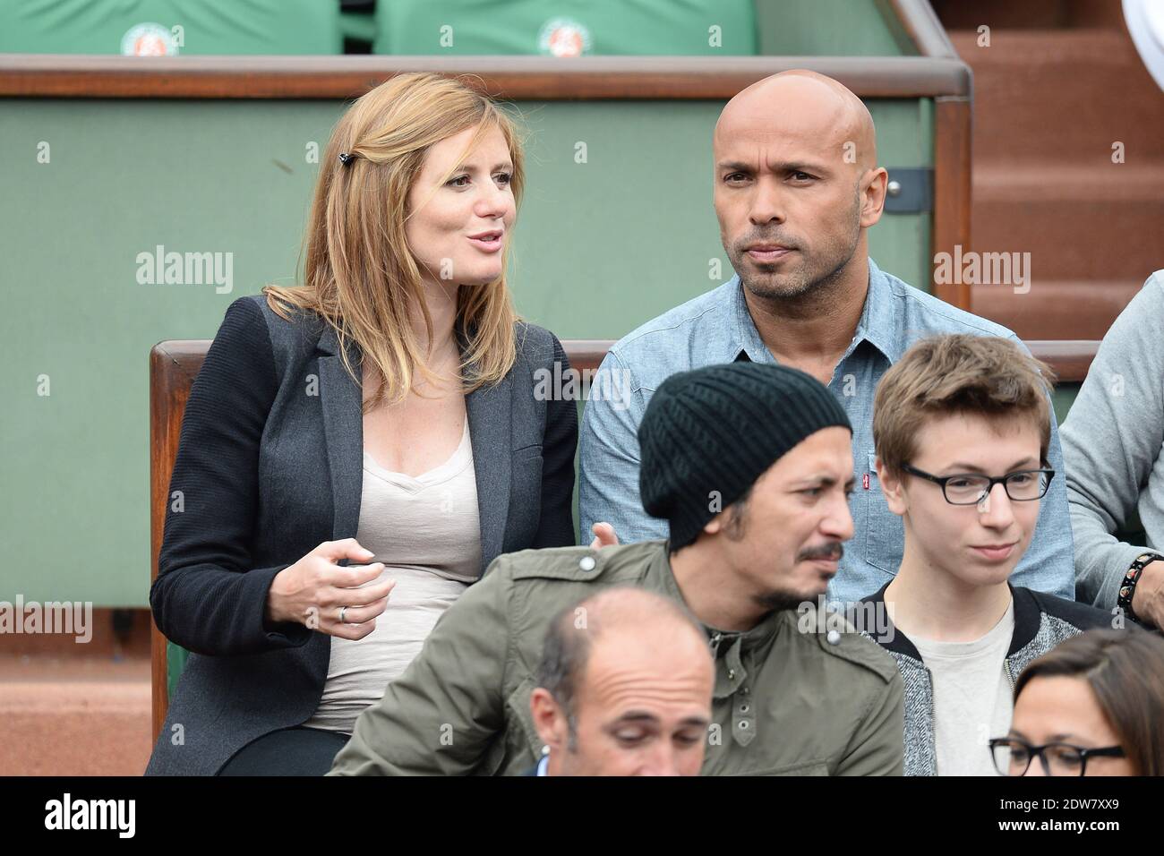 Eric Tudor and his wife watching a game during the second round of the ...