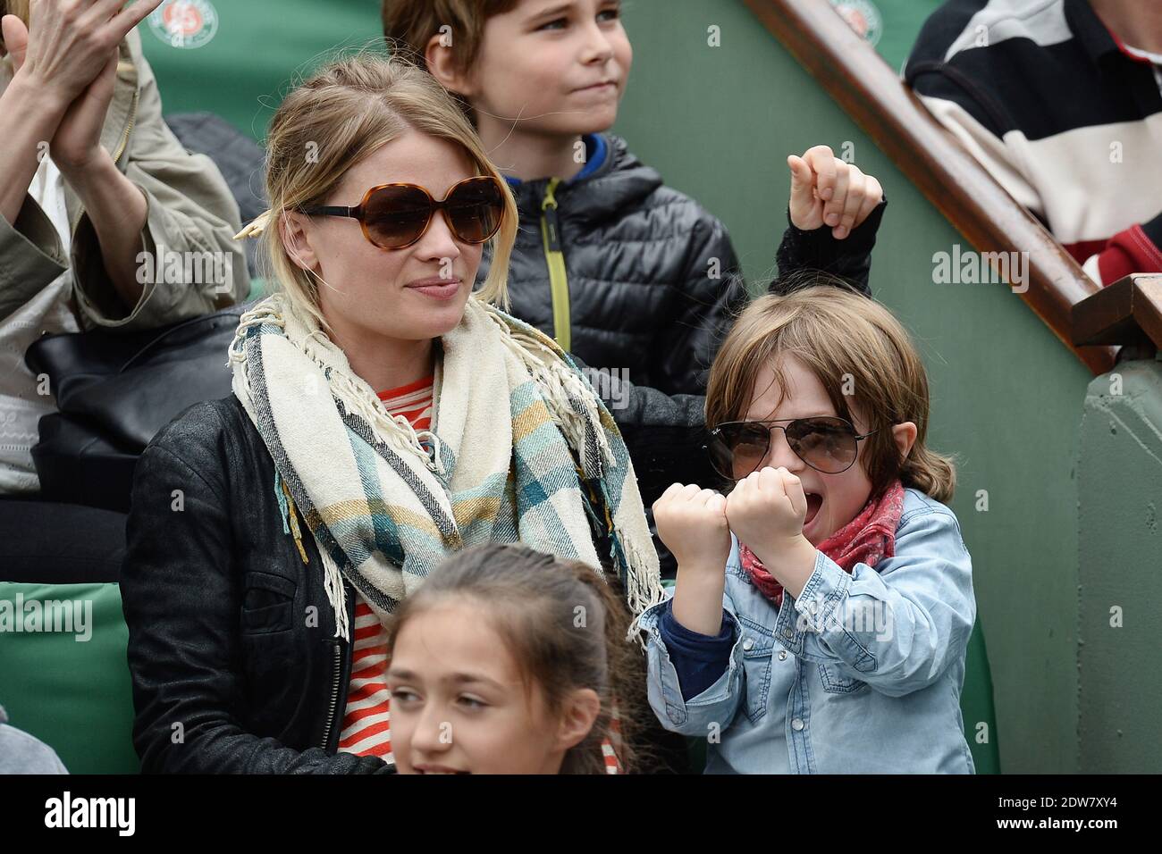 Melanie Thierry and her son watching a game during the second round of ...