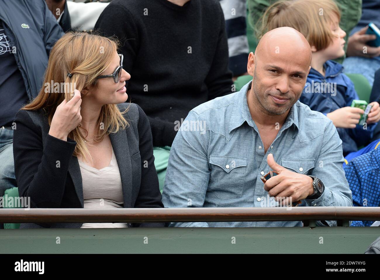 Eric Tudor and his wife watching a game during the second round of the ...