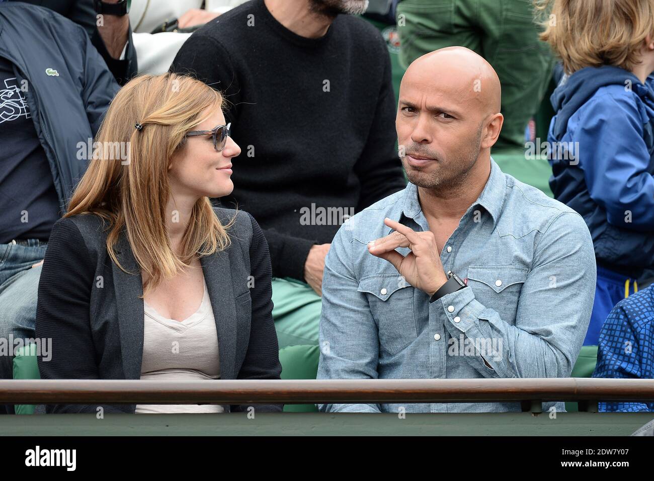 Eric Tudor and his wife watching a game during the second round of the ...
