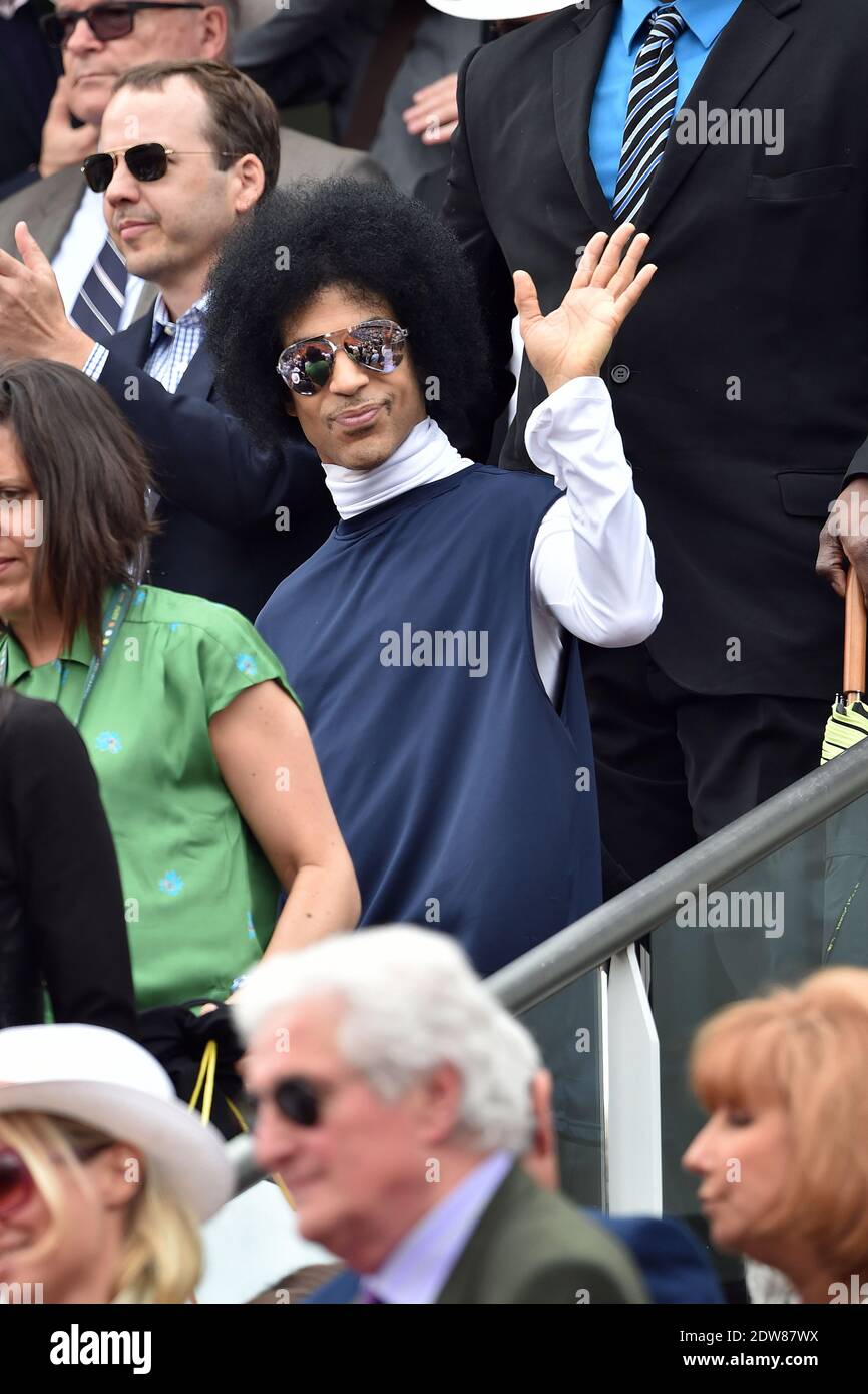 Singer Prince watches from the stands Spain’s Rafael Nadal playing ...