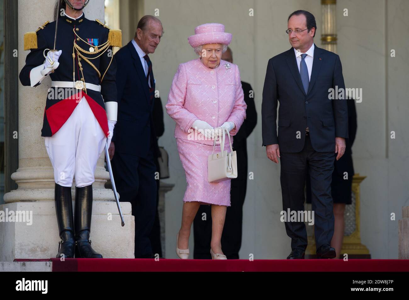 Queen Elizabeth II leaves the Elysee Presidential Palace after the ...