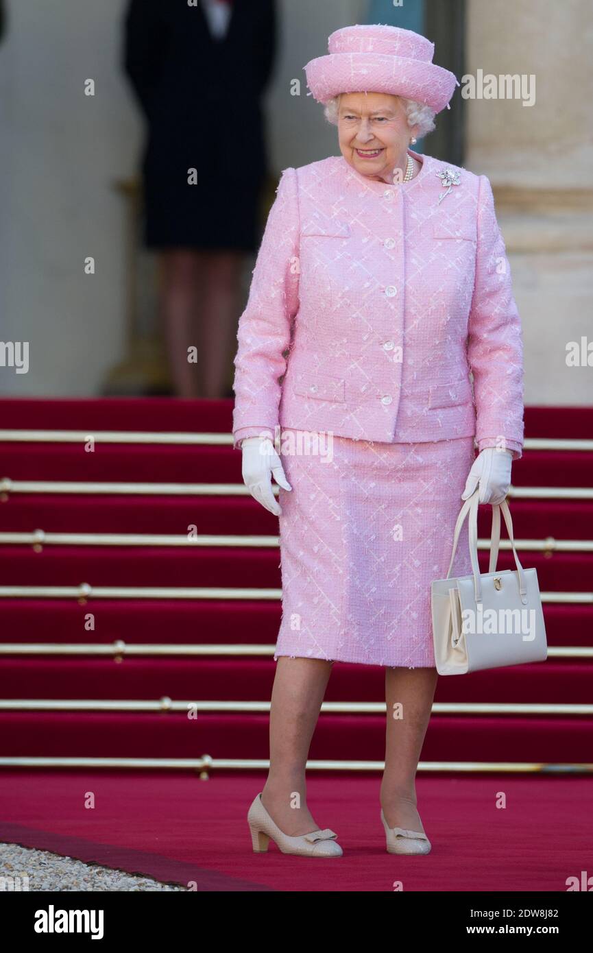 Queen Elizabeth II leaves the Elysee Presidential Palace after the ...