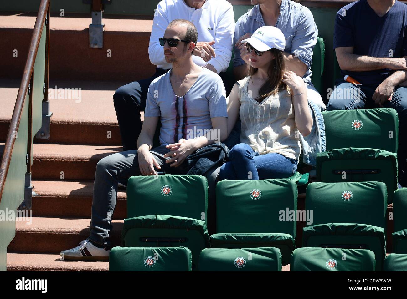 Calogero and his wife attending a French tennis Open semi-final match ...