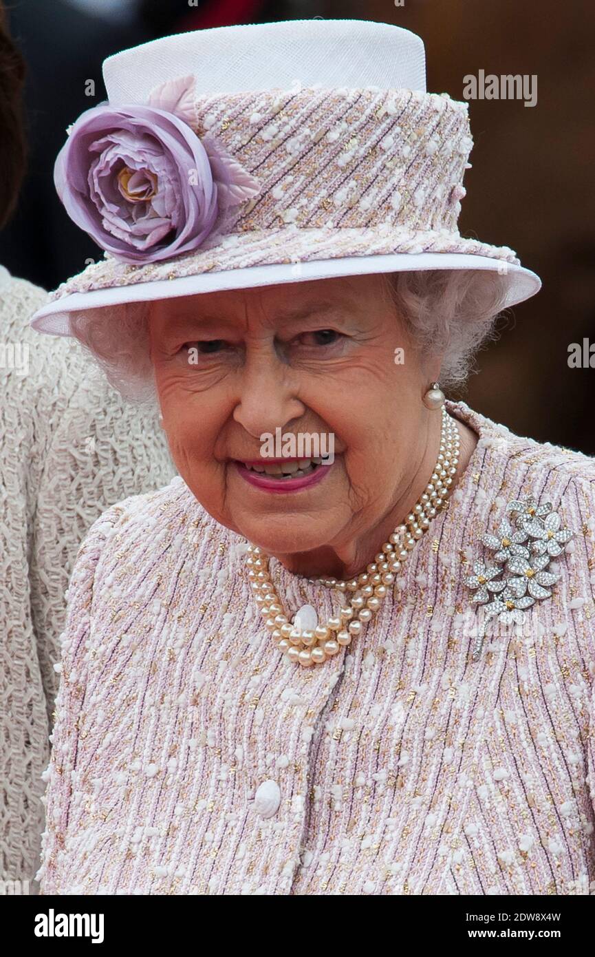Queen Elizabeth II arriving at the 'Hotel de ville', as part of the ...