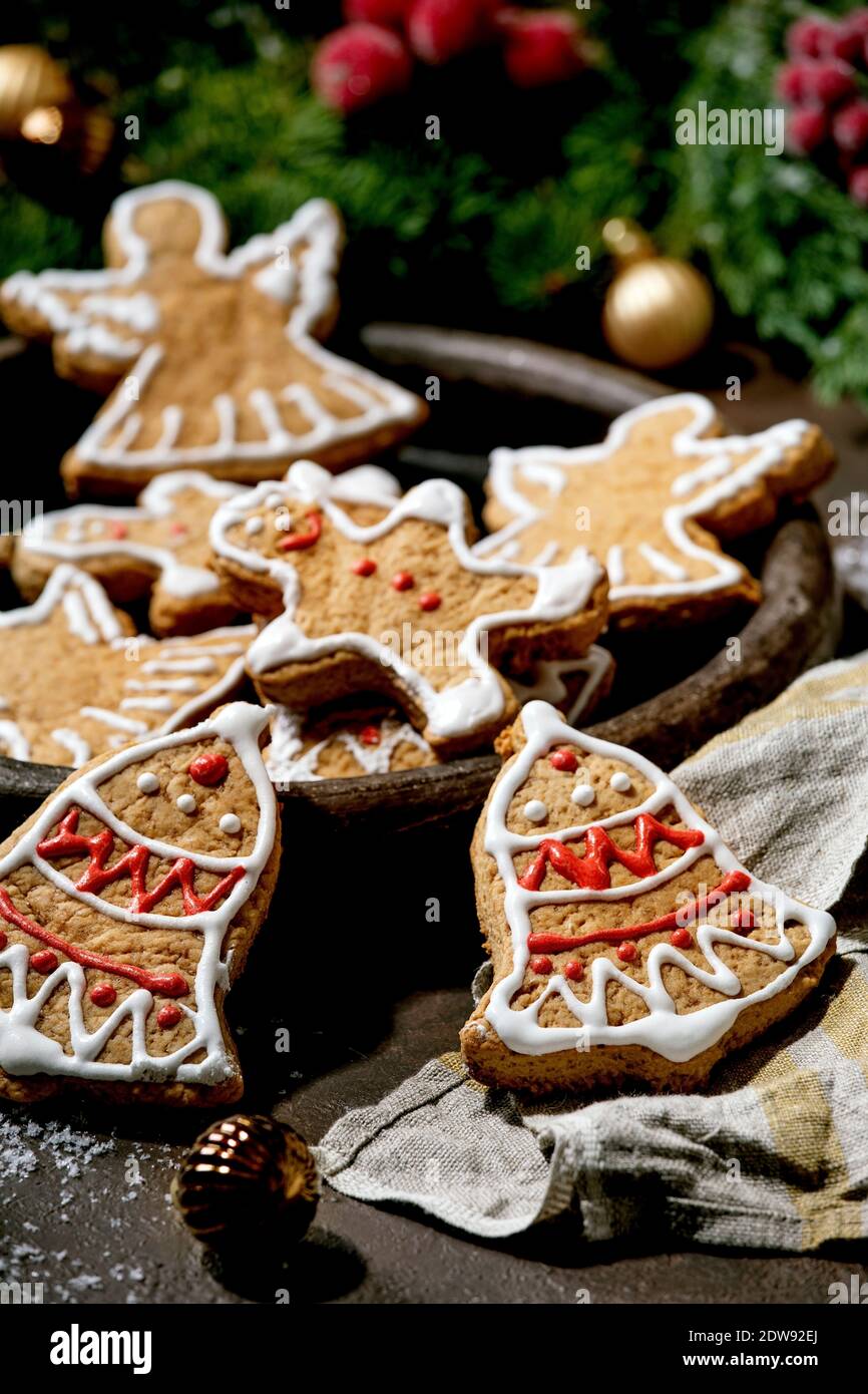 Homemade traditional Christmas gingerbread cookies with icing ornate ...