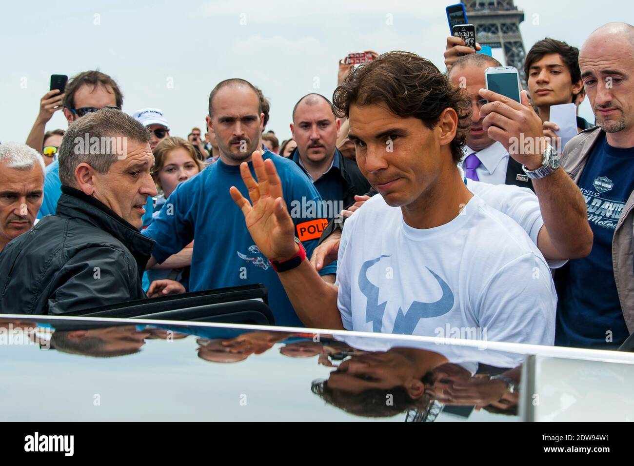 Rafael Nadal holds the championship trophy during a posing session in ...