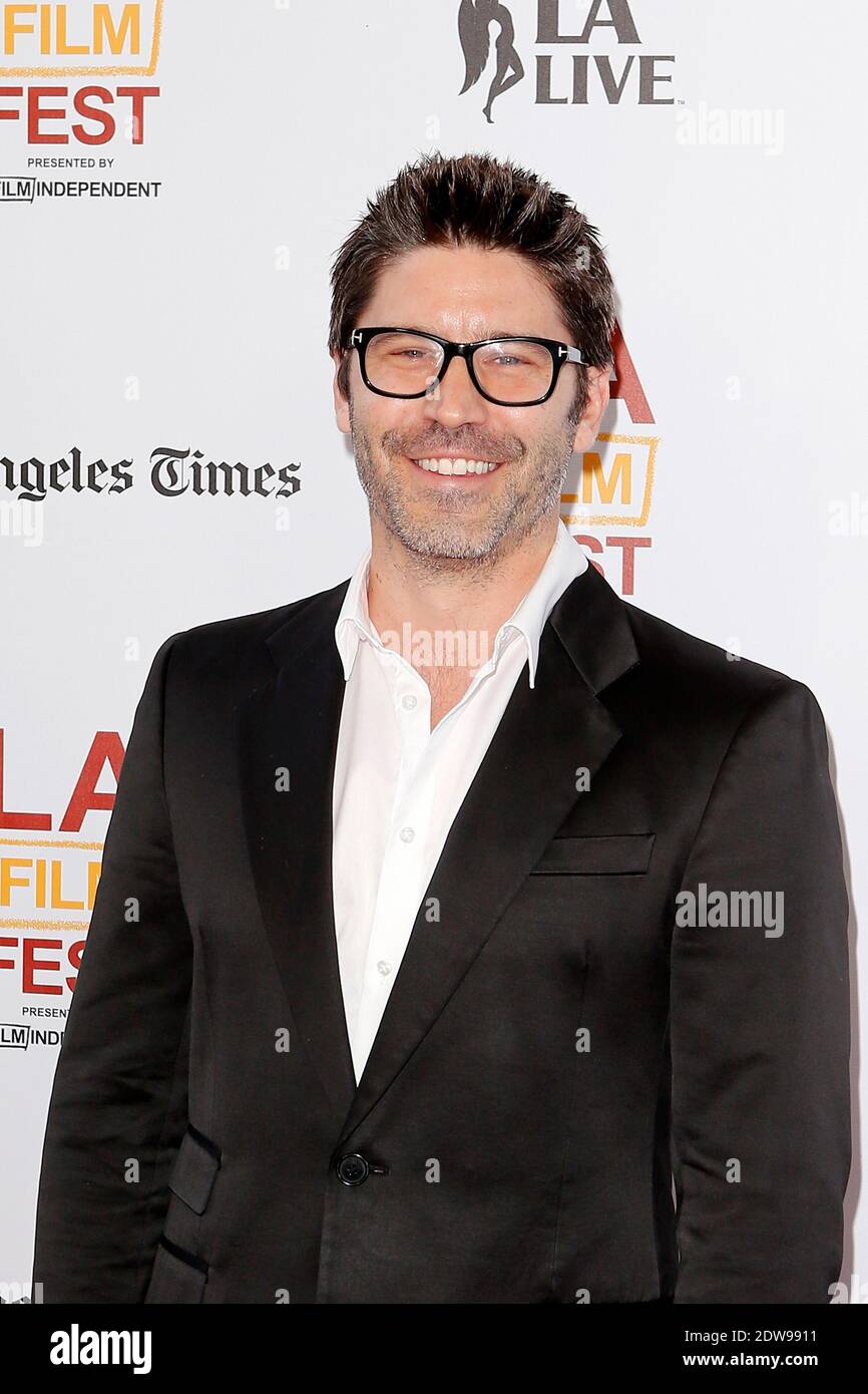 David W. Ross attends the opening night premiere of Snowpiercer during ...
