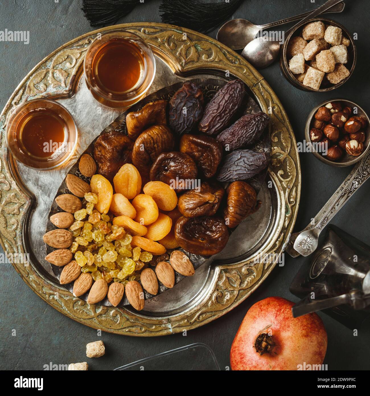 Traditional arabic tea and dry fruits and nuts, flat lay, space for ...