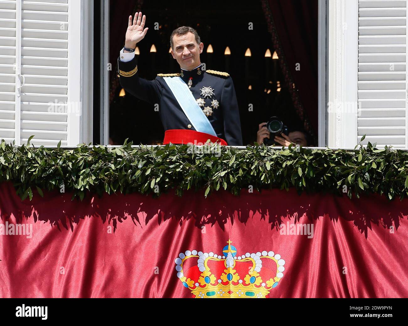 King Felipe VI of Spain appearing at the balcony of the Royal Palace ...