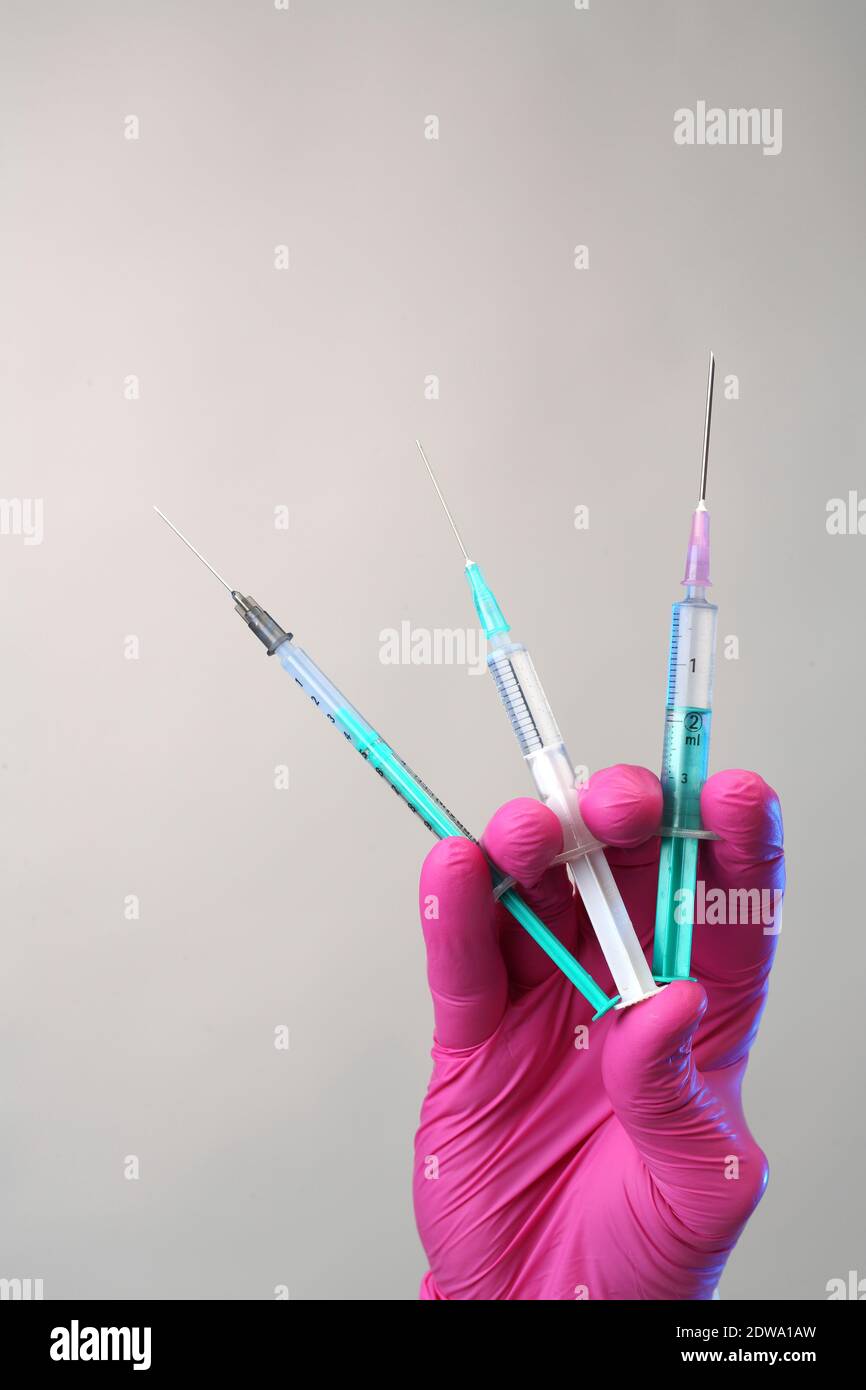 Syringes three syringes hi-res stock photography and images - Alamy